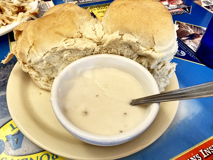 Pillowy biscuits swimming in creamy gravy - comfort food that hugs your soul from the inside out.