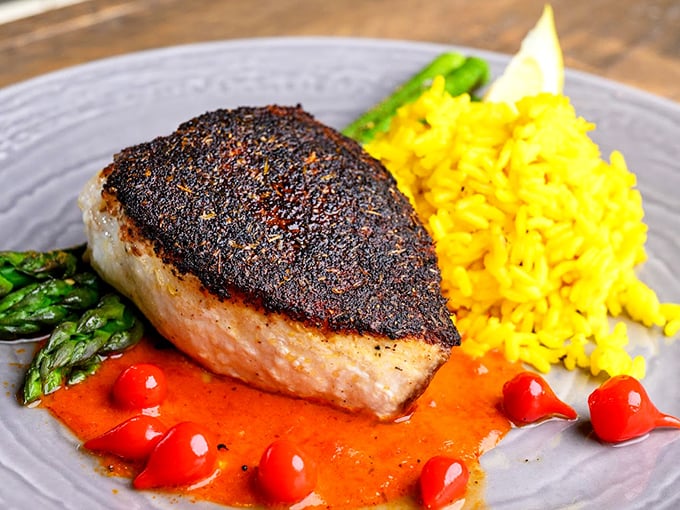 The blackened crust on this swordfish tells a story of perfect timing and temperature, while the saffron rice glows like Michigan sunshine.