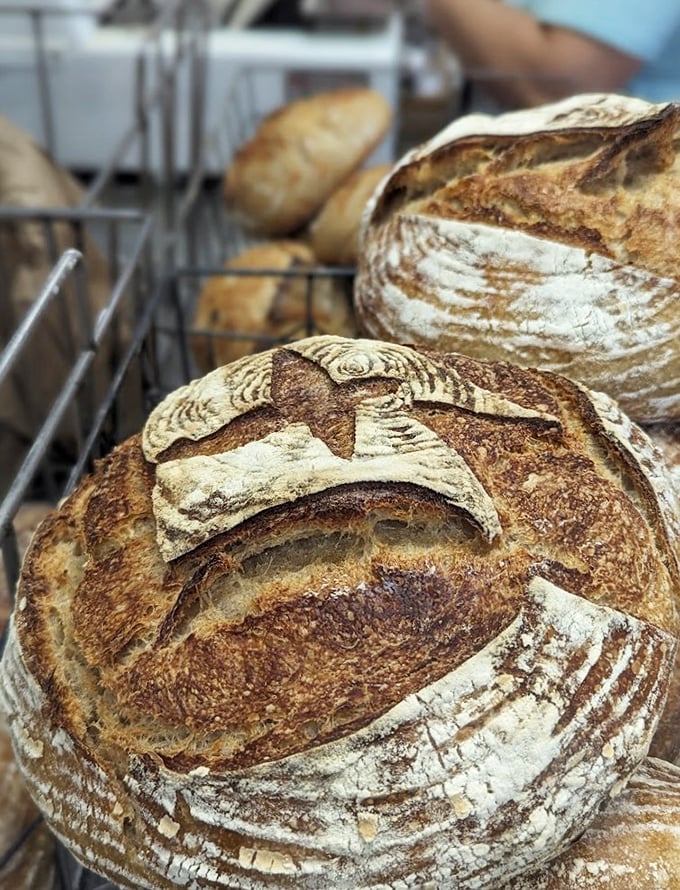 This artisanal loaf isn't just bread&mdash;it's edible architecture with a perfectly scored top and rustic crust.