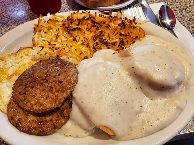 Biscuits smothered in country gravy, with eggs and hash browns playing backup. This is breakfast's greatest hits album. Photo credit: Francisco Rios