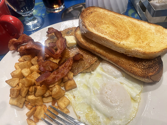 The classic breakfast trinity: eggs, bacon, and toast. Sometimes the simplest combinations are the most satisfying. Photo credit: Patty Wapshott