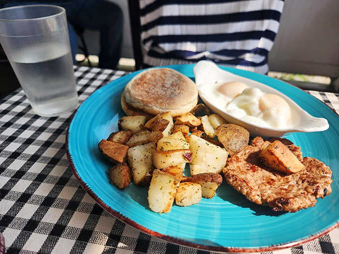 Home fries seasoned to perfection join forces with eggs that clearly graduated from breakfast academy with honors.