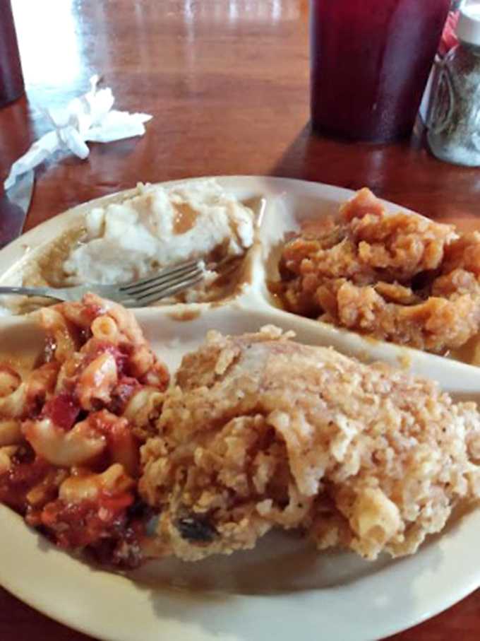 Southern comfort on a plate&mdash;where mac and cheese mingles with crispy chicken like old friends at a reunion.