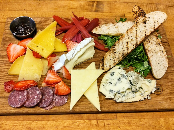 A carefully curated board of local and imported cheeses, meats, and fruits that tells a delicious story with every bite.