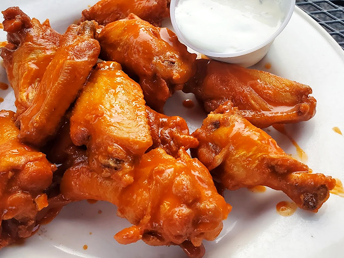 These buffalo wings aren't messing around &ndash; they're bringing the heat and the sweet in perfect harmony. Photo credit: Kham Inthirath