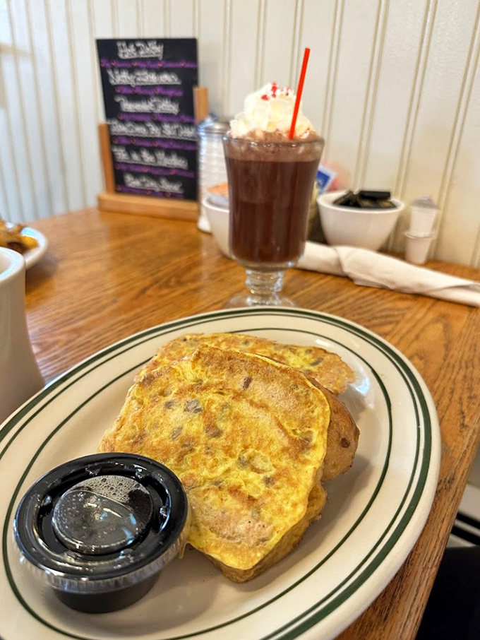 This isn't just French toast; it's a crunchy, custardy, maple-soaked revelation. It's the breakfast that launched a thousand food selfies and zero regrets.