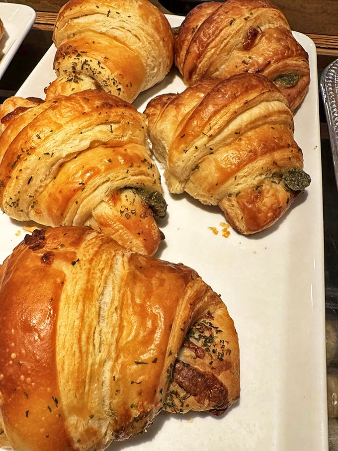 Herb-dusted croissants that look like they just won a beauty pageant for breakfast pastries.