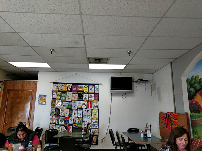 A wall of memories! These colorful banners tell stories of good times and great food shared within these walls. 