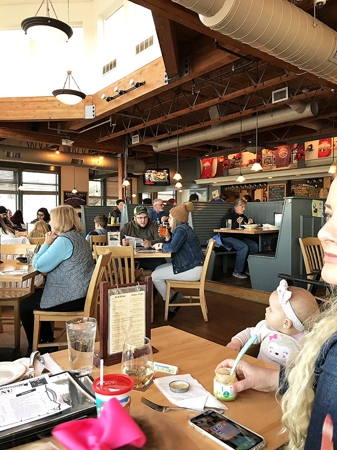 Where strangers become friends over shared plates and laughter. This dining area is the heart of Federal Jack's, pumping out good vibes and great food.