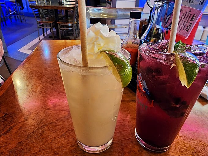 Refreshing cocktails garnished with lime and topped with whipped cream &ndash; the perfect way to toast a Maine summer evening. Photo credit: Lori Newton