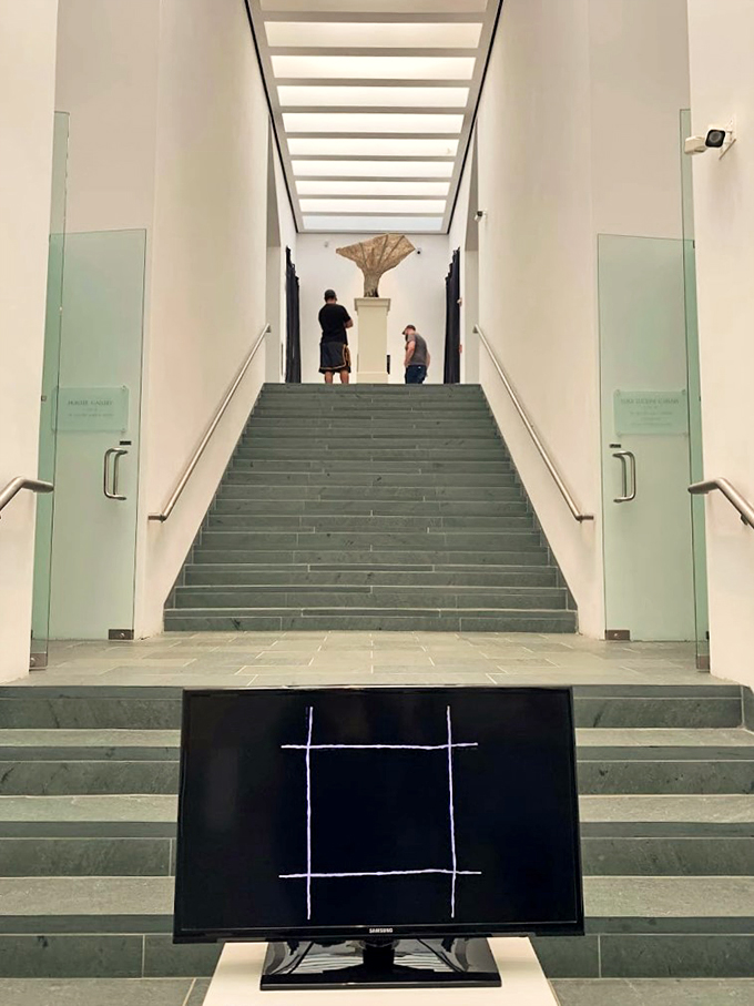 This sleek entrance promises artistic enlightenment. Just don't expect any elevators in this temple of creativity!