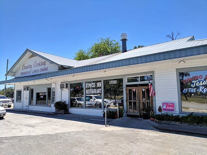 White clapboard siding and red trim frame this slice of Old Florida, where country cooking has been drawing crowds since 1928.