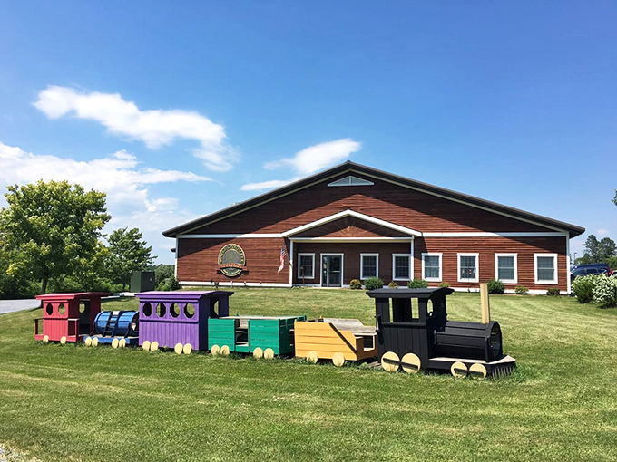 The factory's playful spirit shines through with its lawn-decorating train, inviting visitors to explore Vermont's toy-making magic.