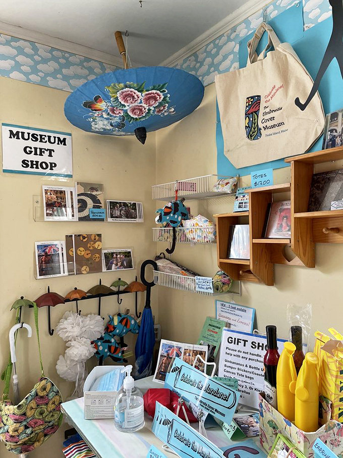 Even the gift shop celebrates the whimsical spirit, complete with decorated umbrellas and charming tote bags for fellow cover enthusiasts.