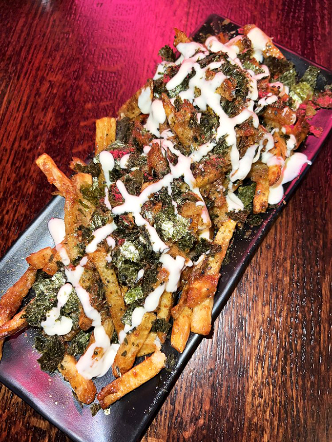 Fries that weathered the storm and came out victorious. These crispy, sauce-laden rebels laugh in the face of diet plans.