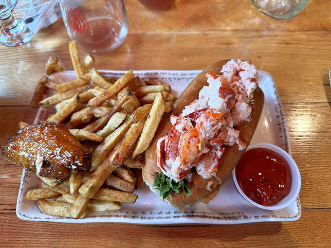 The classic Maine lobster roll, generously stuffed and ready to transport you to seafood paradise.