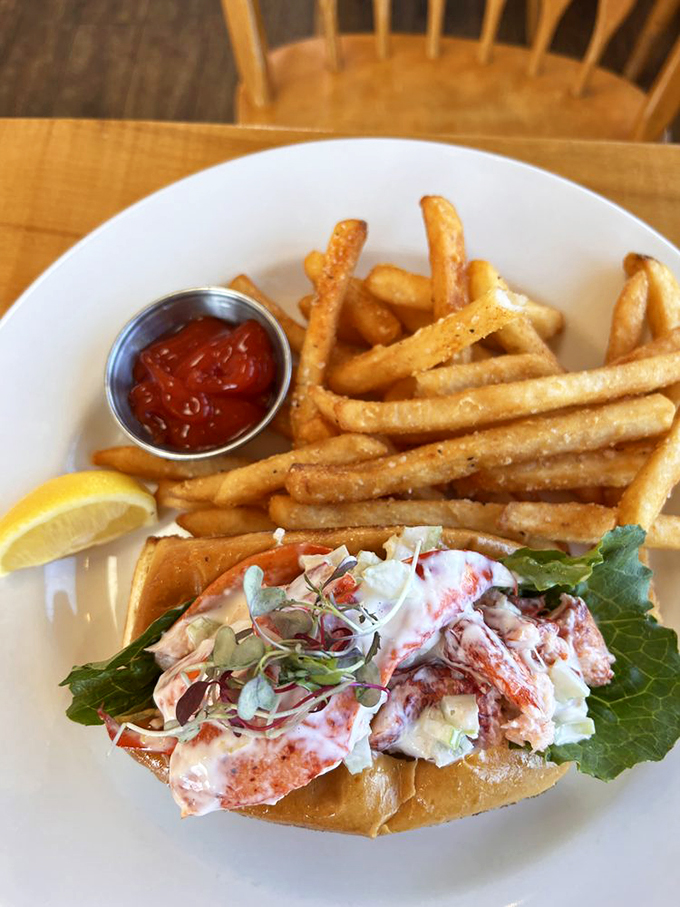 The classic Maine lobster roll: simple, elegant, and stuffed with more meat than a politician's promises. 