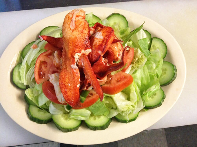 Another view of their famous lobster salad - where fresh seafood meets garden-crisp vegetables in perfect harmony.