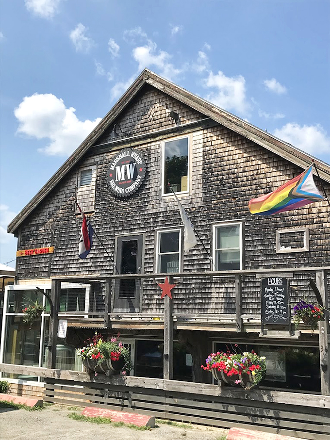 Marshall Wharf Brewing Company's weathered shingles and flower boxes tell stories of both maritime heritage and craft beer innovation. Photo credit: Jason Babineau