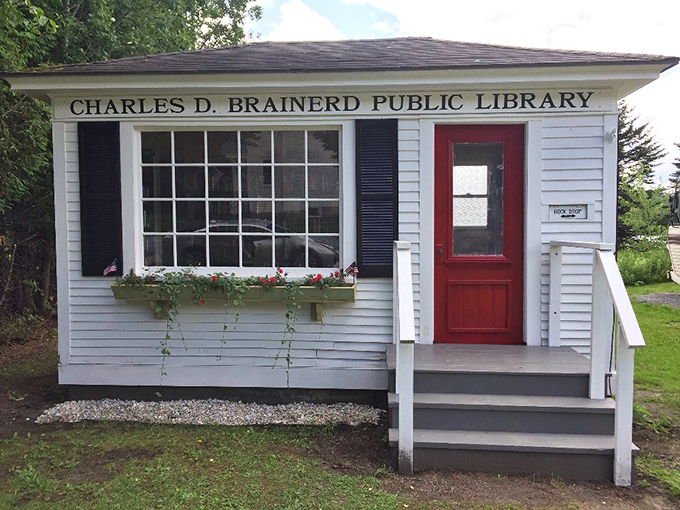 The Charles D. Brainerd Public Library proves good things come in small packages, with its charming window box and welcoming red door.