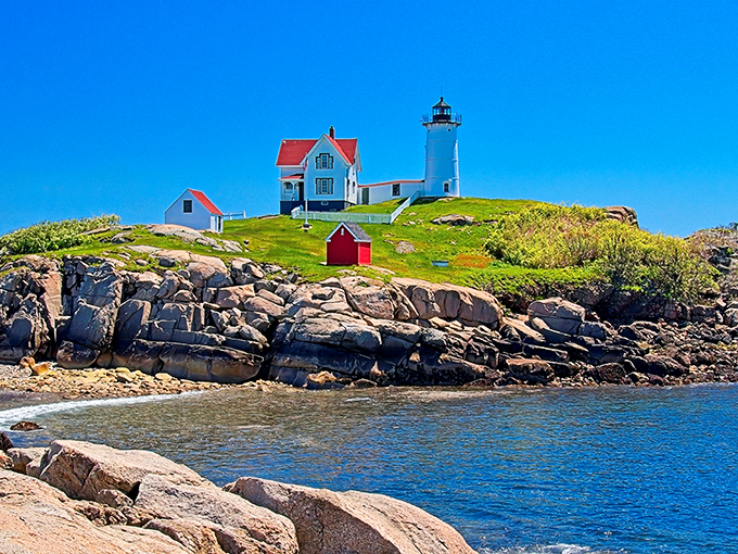 Lighthouse, camera, action! This iconic beacon isn't just guiding ships; it's calling all seafood enthusiasts to Fox's Lobster House like a siren song.