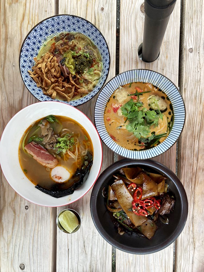 A feast for both eyes and stomach &ndash; four different noodle dishes showcase The Honey Paw's range of Asian flavors. Photo credit: Sheryl C.
