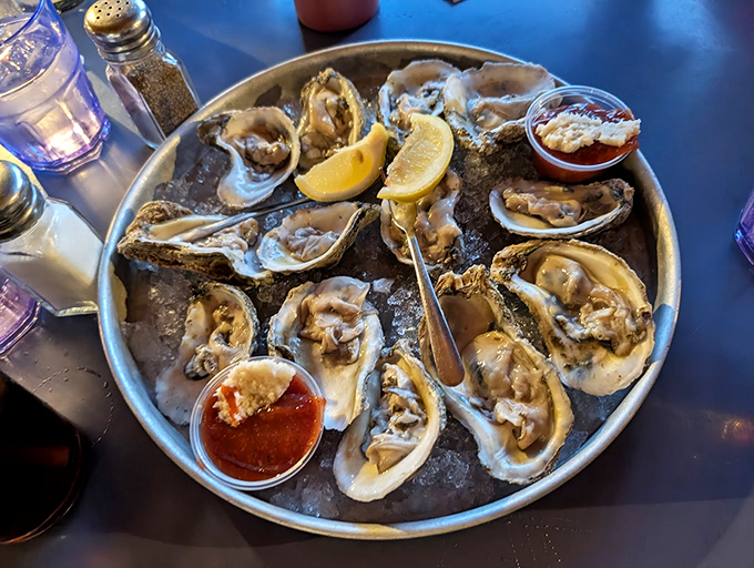 Fresh oysters on the half shell, arranged like pearls on ice - nature's perfect appetizer. Photo credit: David Letts