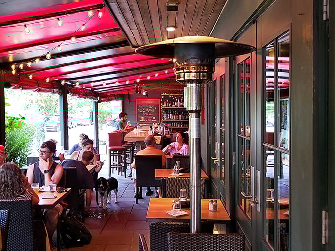 The covered patio creates an outdoor living room, where string lights twinkle above happy diners enjoying Bar Harbor's perfect summer evenings. Photo credit: John Bartz