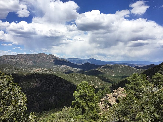 Sunlight breaks through clouds to spotlight the mountainscape, nature's version of a standing ovation.