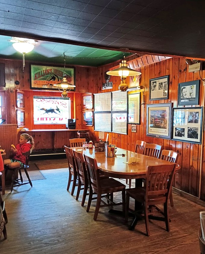 Every photo on these walls is a chapter in the restaurant's ongoing story.