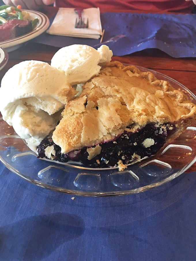 Blueberry pie à la mode: Maine's edible hug! This slice of heaven is so good, it might make you consider moving to the Pine Tree State.