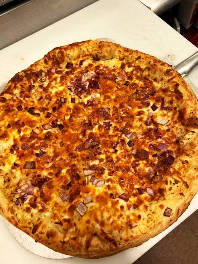 A pizza that proves sometimes the best things in life come topped with plenty of cheese and local charm.