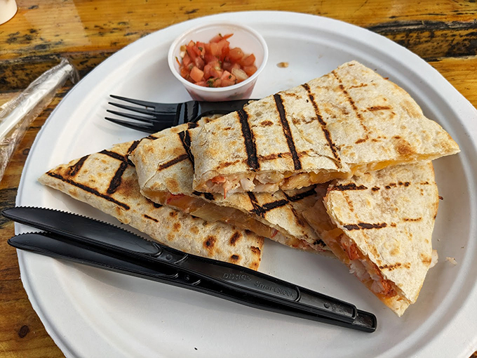 Grilled perfection meets seafood innovation in this quesadilla that bridges Mexican flair with Down East flavor. Photo credit: Susan Carvel