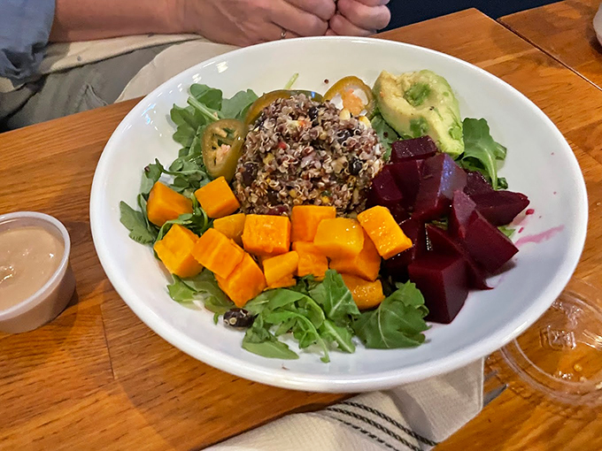 A vibrant quinoa bowl that's like an edible color wheel, featuring golden butternut squash and ruby-red beets. Photo credit: Glenn Reynolds
