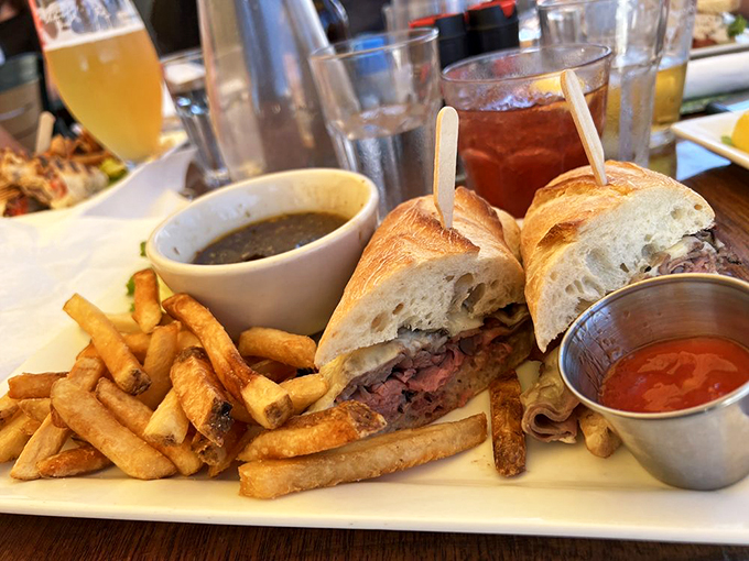 A sandwich that's more stacked than your grandmother's photo albums, with fries that could make a potato proud. Photo credit: Isaac C.