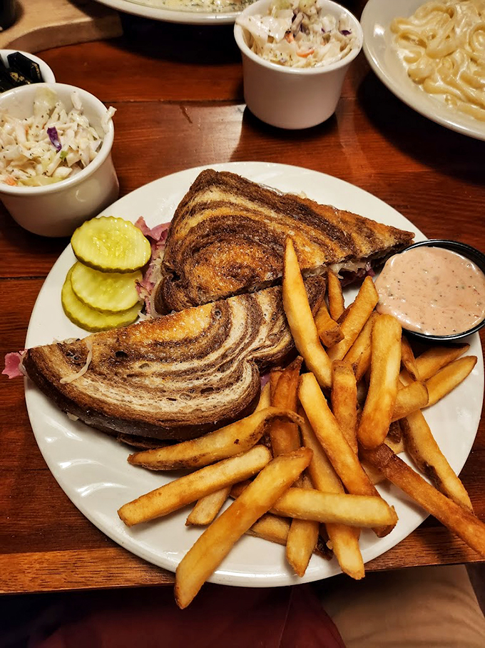A classic Reuben on marble rye with fries so golden, they deserve their own trophy case.