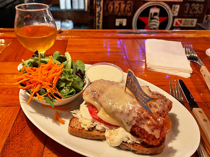 A perfectly balanced plate: crispy chicken sandwich meets fresh garden salad, proving comfort food can play nice with healthy choices.