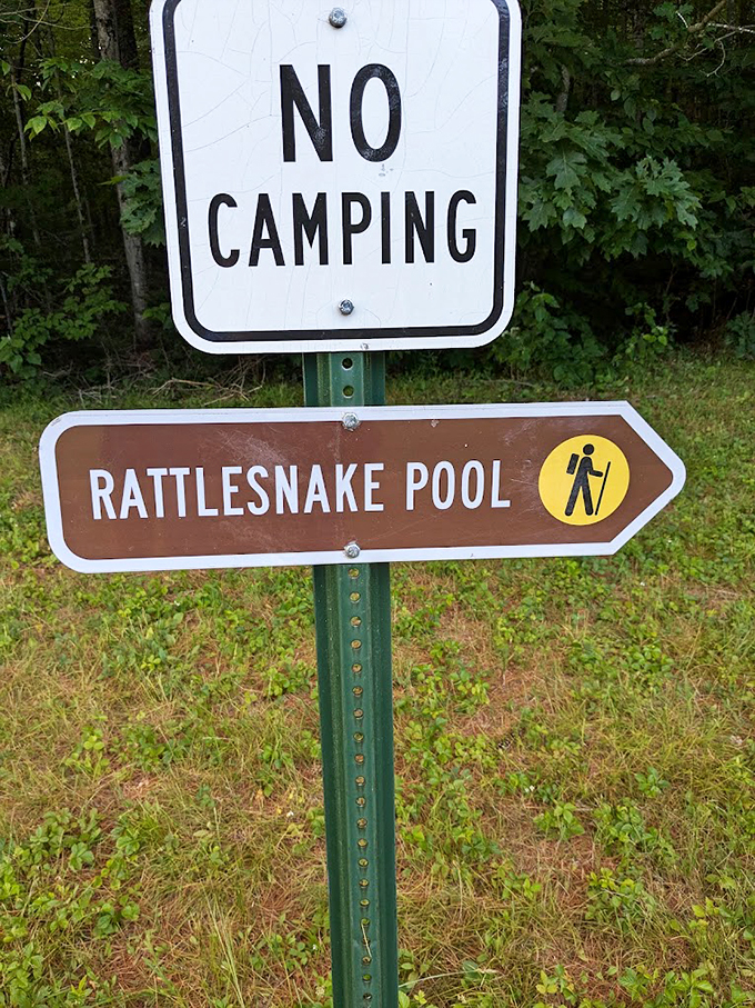 Clear directions and a firm "No Camping" reminder - because even paradise needs some ground rules.