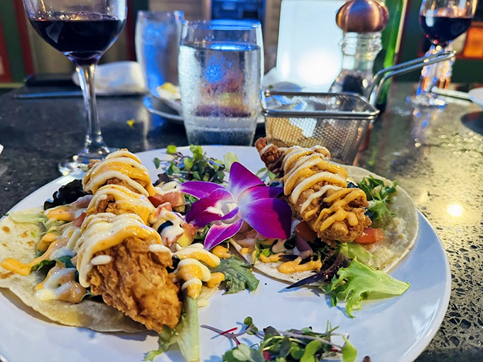 These tacos, adorned with edible flowers, prove that seafood can dress up for a fancy night out.