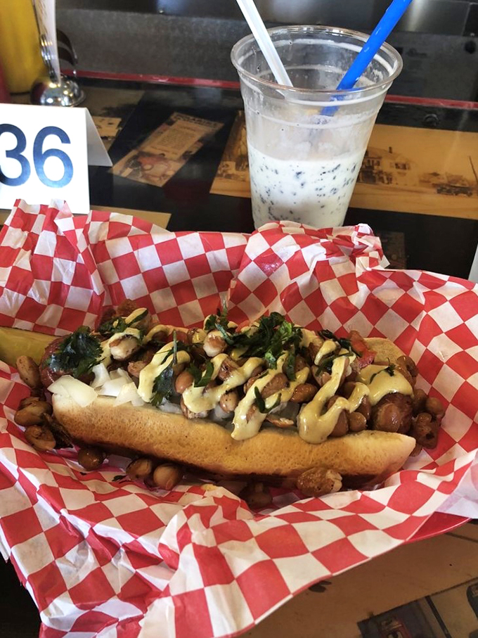 Hot diggity dog! This loaded beauty is like a flavor explosion wrapped in a bun. It's not just a meal, it's an edible adventure.