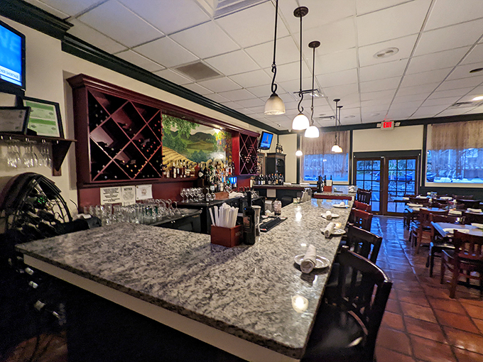 Where libations come to life! This well-stocked bar is like an adult candy store, promising delightful concoctions to complement your meal. Photo credit: Maria Hidalgo Dolan