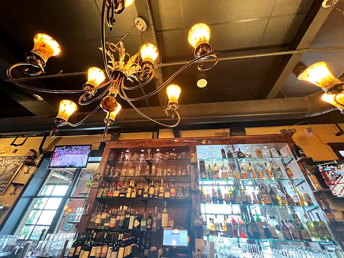 Bottoms up at Cafe Sant&eacute;'s bar! With a selection this good, you might find yourself channeling your inner sommelier or mixologist. Cheers!