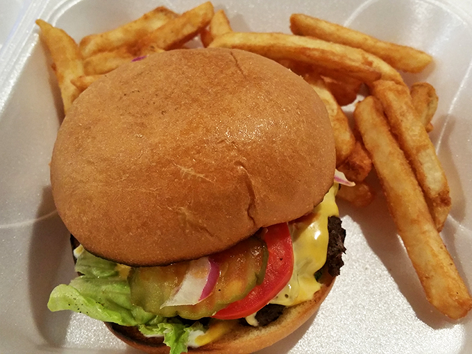 This isn't just a burger, it's a tower of temptation. One bite and you'll be singing "Cheeseburger in Paradise."
