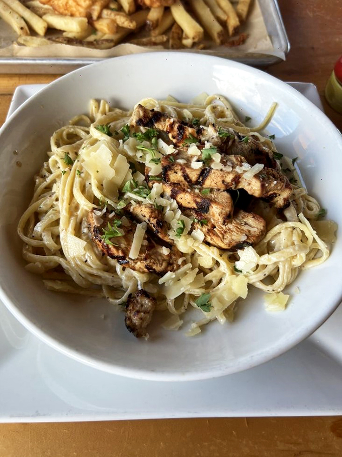 Who knew chicken could swim? This linguine dish proves land and sea make beautiful music together on a plate.