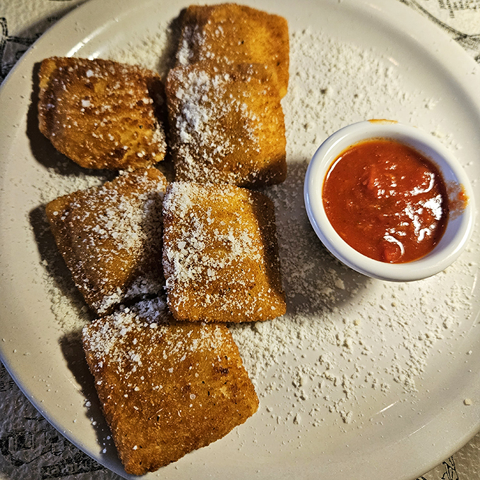 Fried ravioli: Crispy on the outside, gooey on the inside. It's like a hug for your taste buds, if hugs were crunchy and came with marinara sauce. Photo credit: Ty