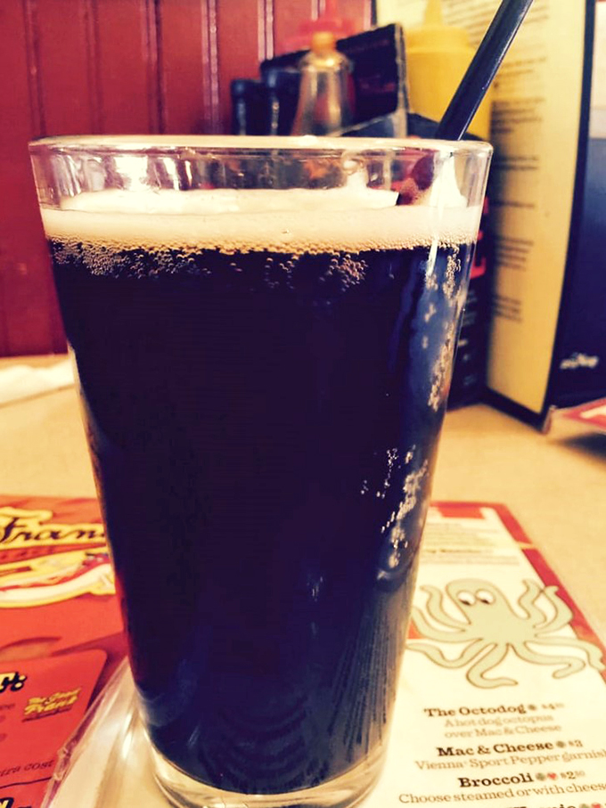 Liquid gold! This frosty brew is the perfect sidekick to your hot dog adventure. It's not just a drink, it's a palate-cleansing potion.