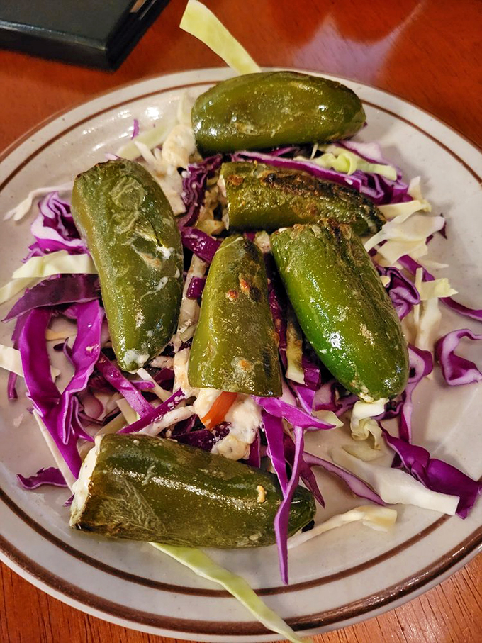 These grilled jalape&ntilde;os are hotter than a desert highway in July! Stuffed with cheesy goodness and served with a cool ranch dip for balance.