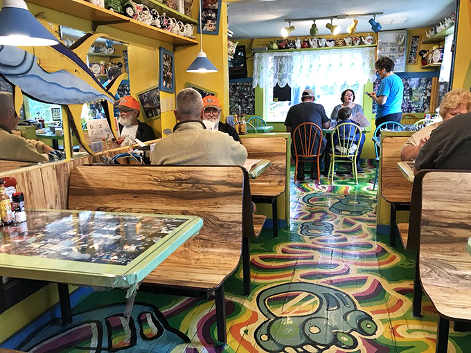 Step into a kaleidoscope of quirky charm! This interior is what happens when Woodstock meets your favorite hometown diner.