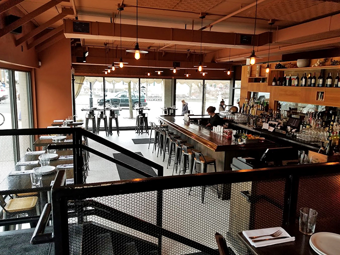 Mani's interior: where rustic charm meets modern flair. It's like your cool Italian cousin's loft&mdash;if that cousin was an amazing chef.