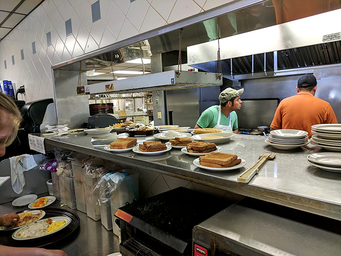 Where the magic happens! City Limits' kitchen is like a well-oiled machine, churning out comfort food faster than you can say